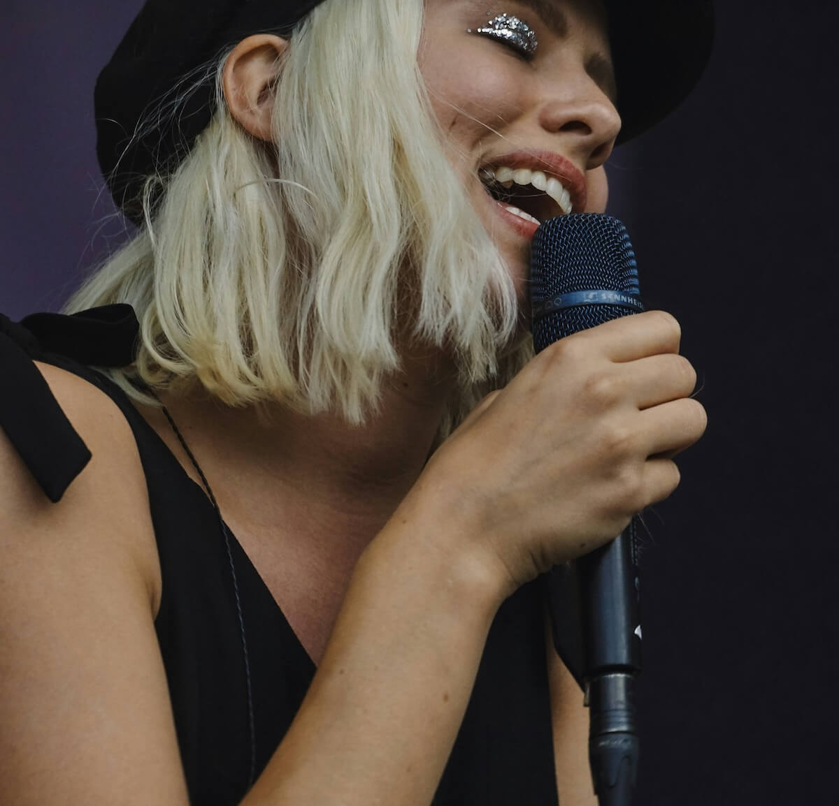 The Best Captions for Every Photo Singing Your Heart Out